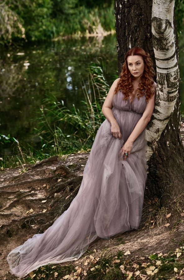 Beautiful Girl in Long Dress in the Forest Stock Photo - Image of ...