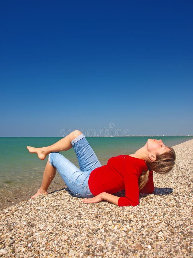 Beautiful Girl Lying on a Beach Stock Image - Image of blue, relaxation ...