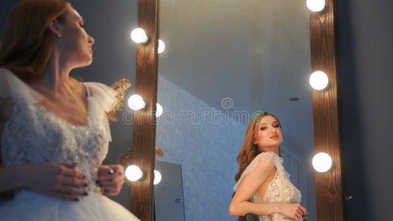 Beautiful Girl Model Posing in Front of a Mirror. Stock Photo - Image ...