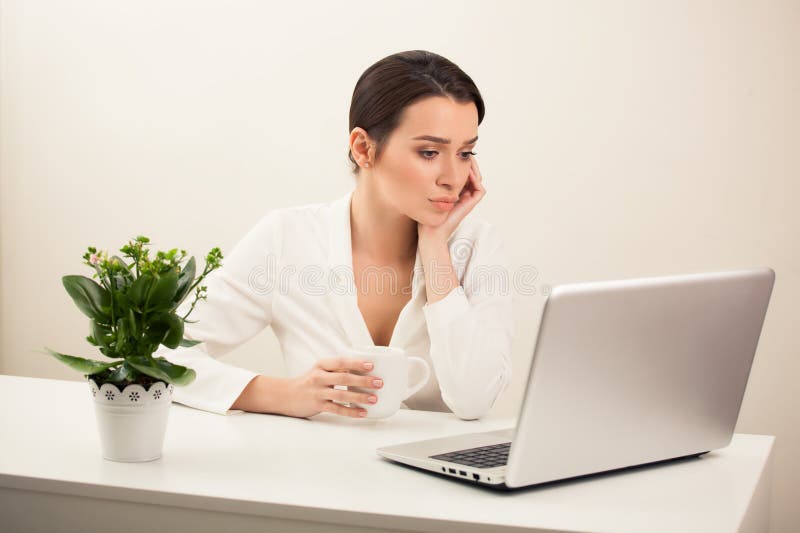 Beautiful Girl in the Office Working on the Computer Stock Photo ...