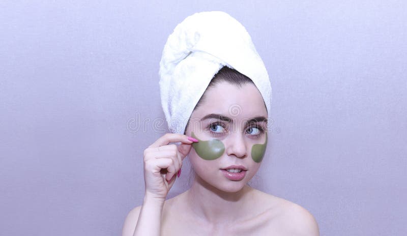 A Beautiful Girl With Patches Takes Care Of Her Skin Stock Image