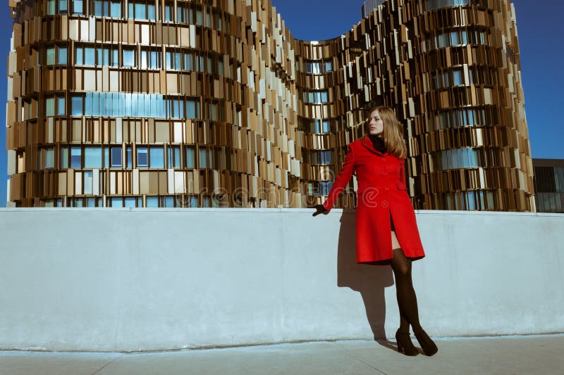 Beautiful Girl Posing with Red Coat Stock Image - Image of pose, coat ...