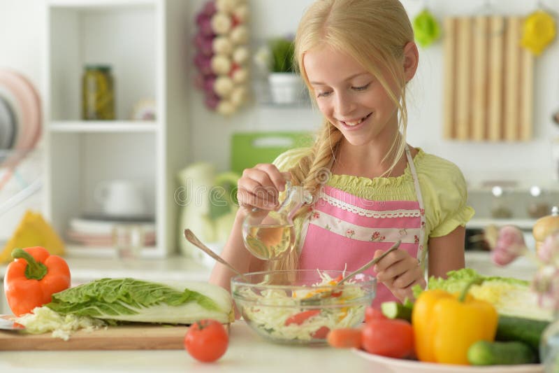 Beautiful Girl Preparing a Salad in the Kitchen Stock Image - Image of ...