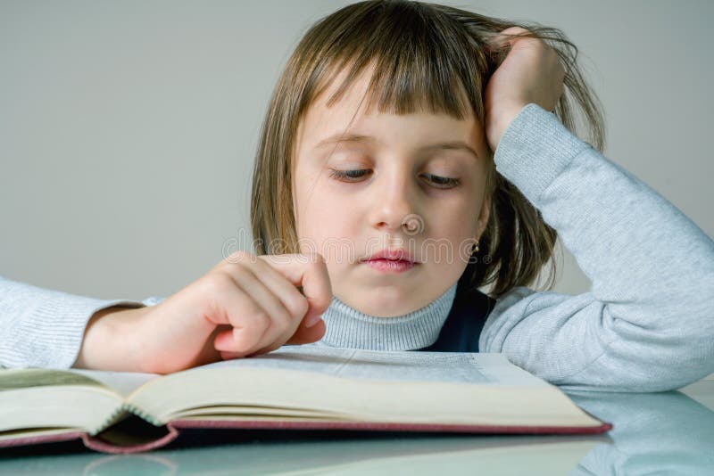 Beautiful Girl Reading a Book. Concepts of Home and Comfort, Place for ...