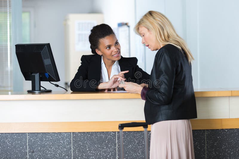Beautiful Girl at Reception Hotel Checking in Stock Image - Image of ...