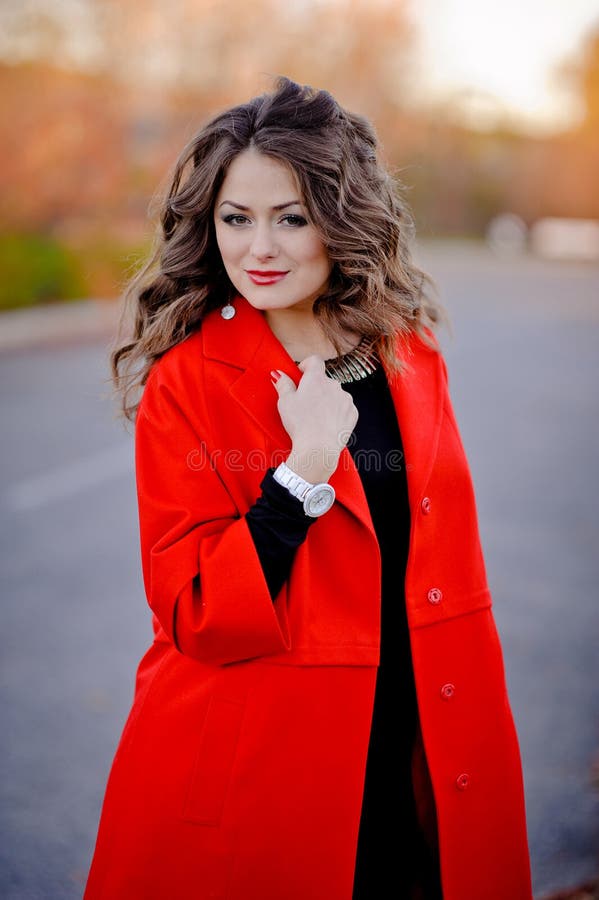 Beautiful Girl in Red Coat Standing on the Road Stock Image - Image of ...