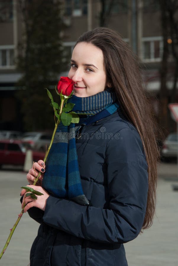 Beautiful Girl with Red Rose in Hand Smiling Stock Photo - Image of ...