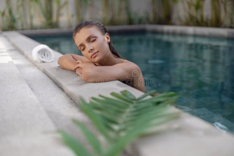 Beautiful Girl Relaxes Around the Pool. Spa Stock Image - Image of skin ...