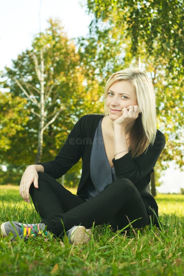 Beautiful Girl Resting in Park Stock Photo - Image of modern, earring ...
