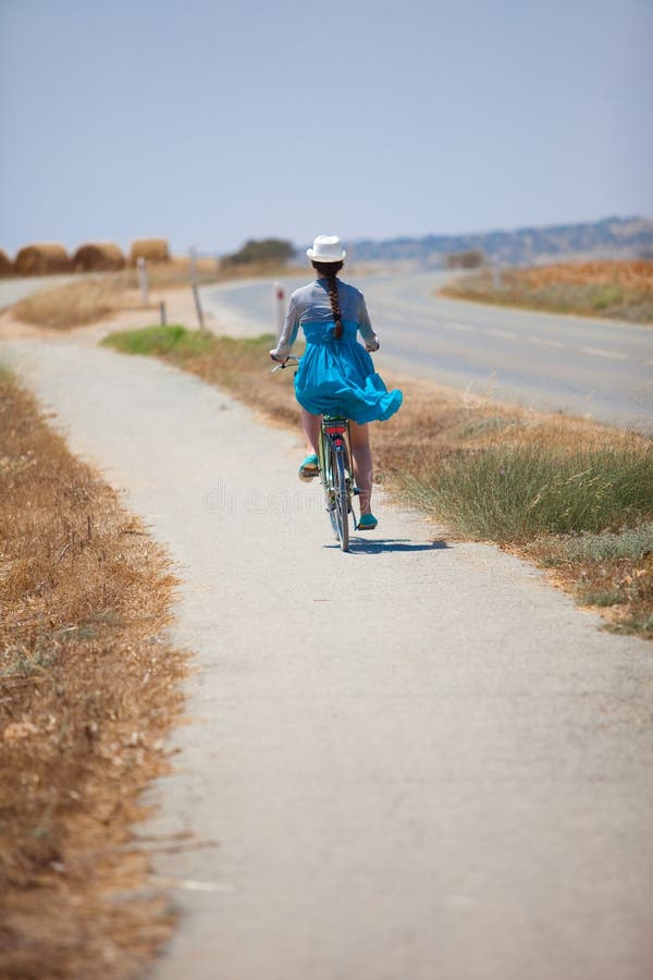 Beautiful Girl Riding Bicycle Picture. Image: 14999423