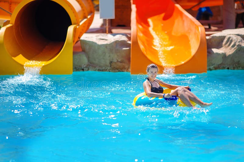 Beautiful Girl Riding a Water Slide Stock Image - Image of fresh ...