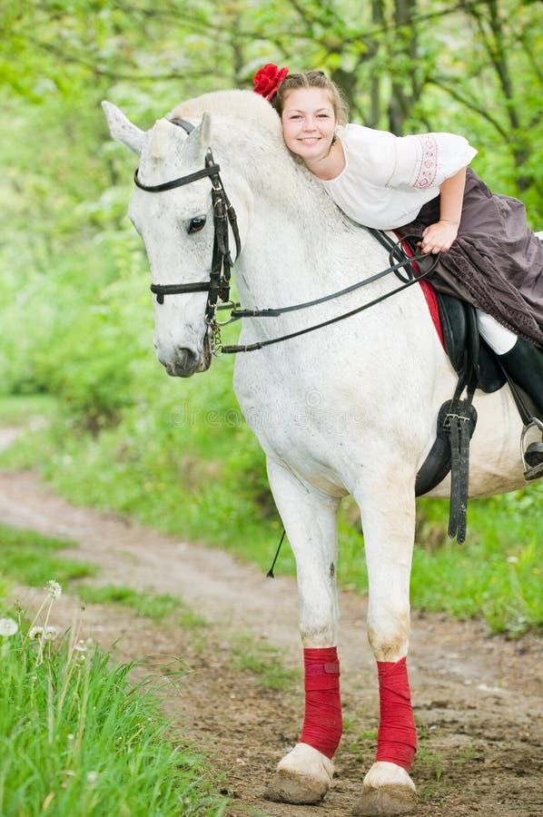 Beautiful Girl Riding White Horse Picture. Image: 10059714