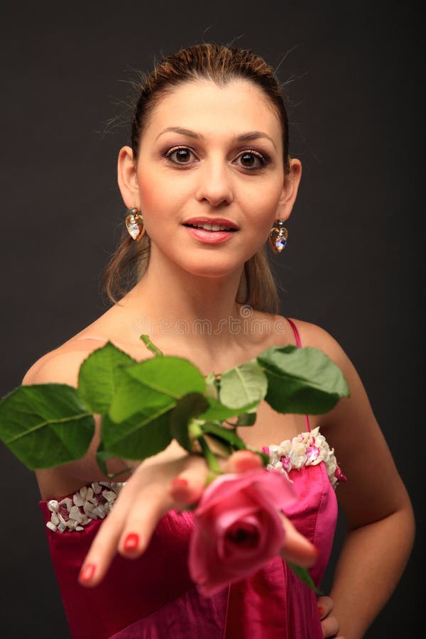 Beautiful girl with a rose stock photo. Image of black - 28237898