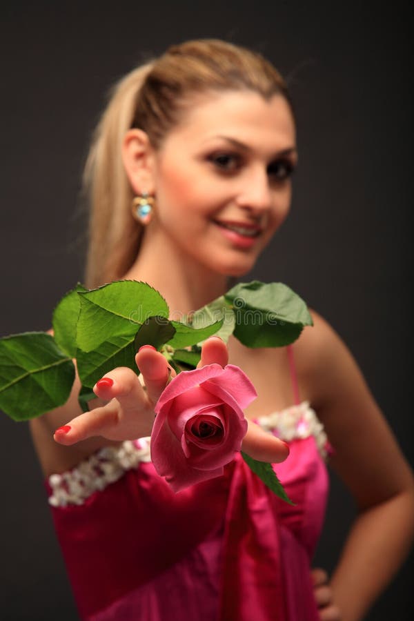 Beautiful girl with a rose stock photo. Image of clothes - 28237912