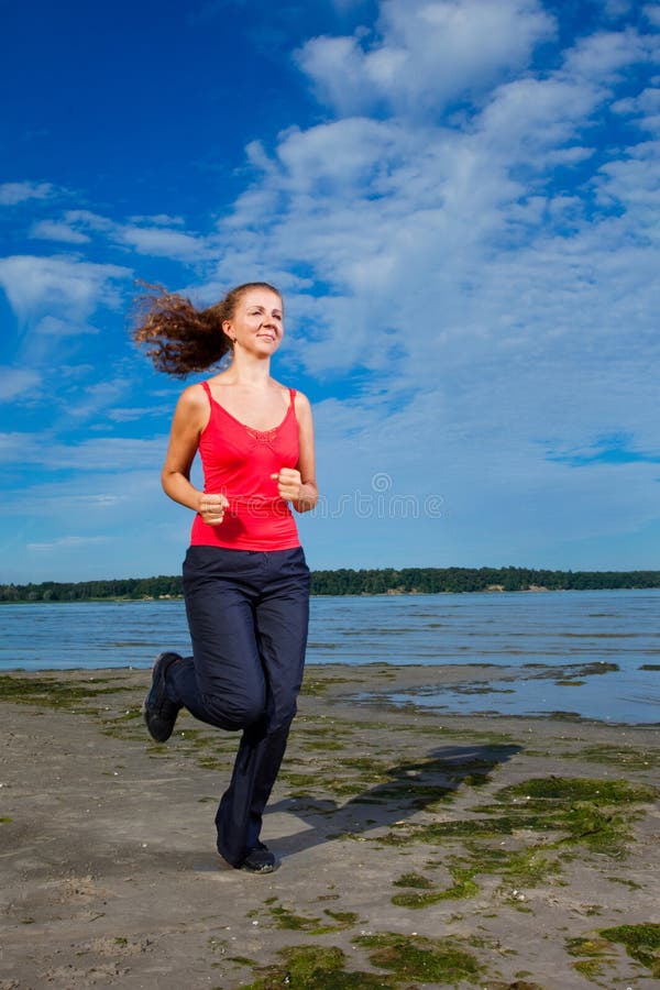 Beautiful Girl Running at the Beach Stock Photo - Image of beach ...