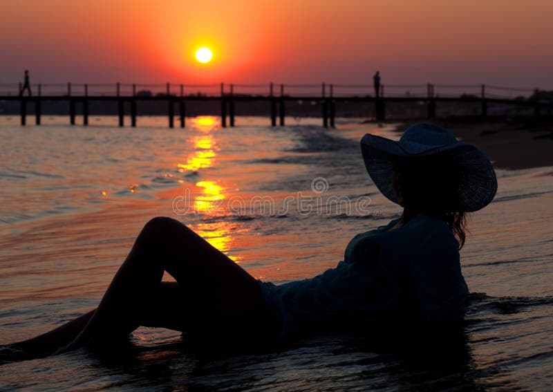 Beautiful Girl on the Seashore at Sunset Stock Photo - Image of beauty ...