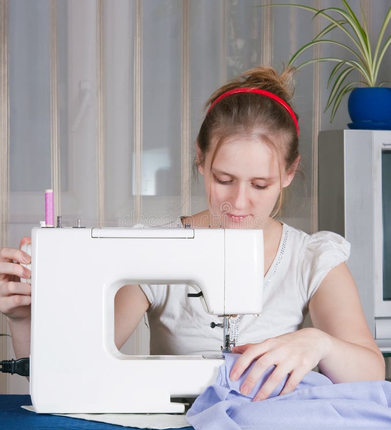 Beautiful girl sewing stock image. Image of overlock - 12185811