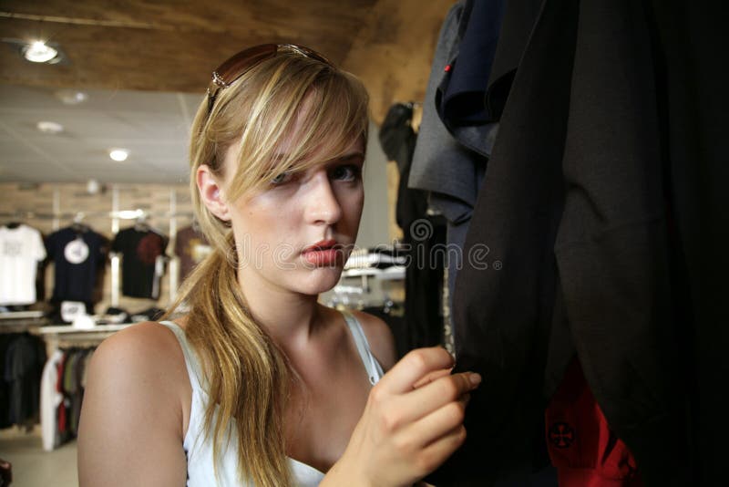 Beautiful girl in shop stock photo. Image of clothes - 13768544