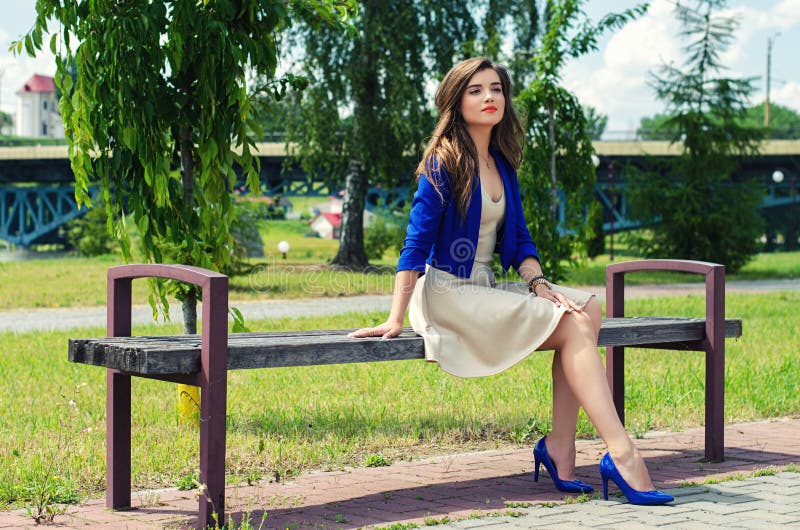 Beautiful Girl Sitting on Bench Stock Photo - Image of bench, lady ...