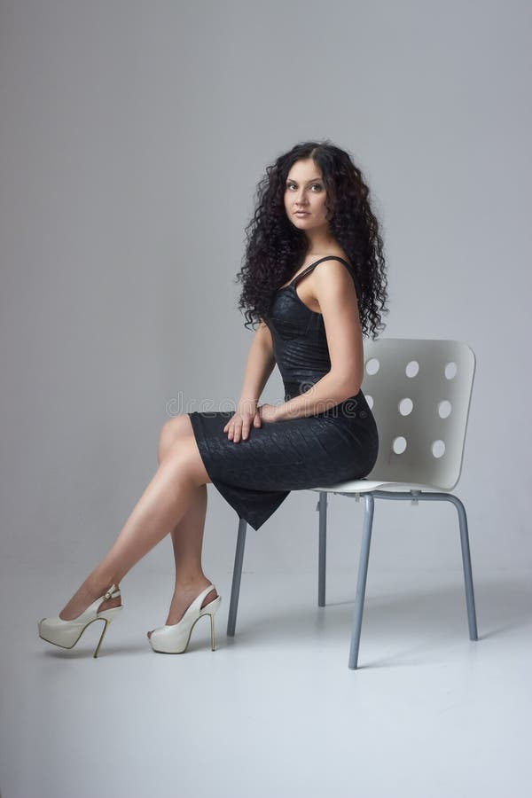 Beautiful Girl Sitting on a Chair Stock Photo - Image of people, board ...