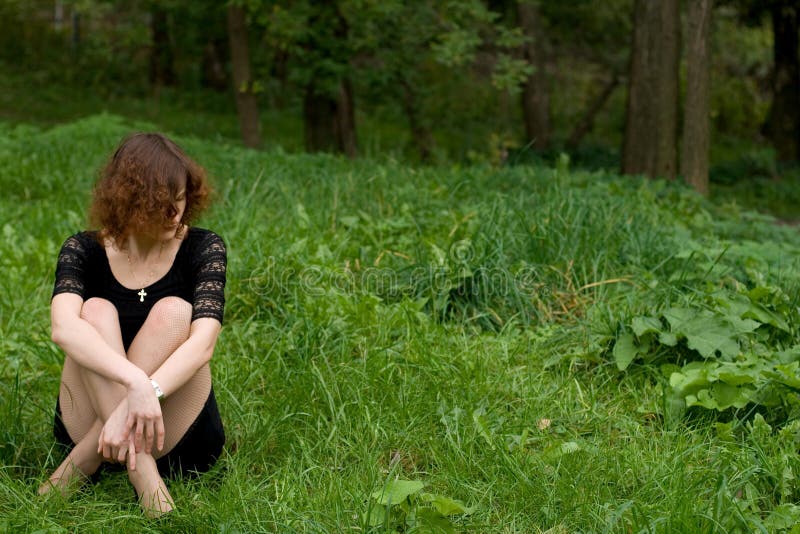 Beautiful Girl Sitting on Grass Stock Photo - Image of attractive ...