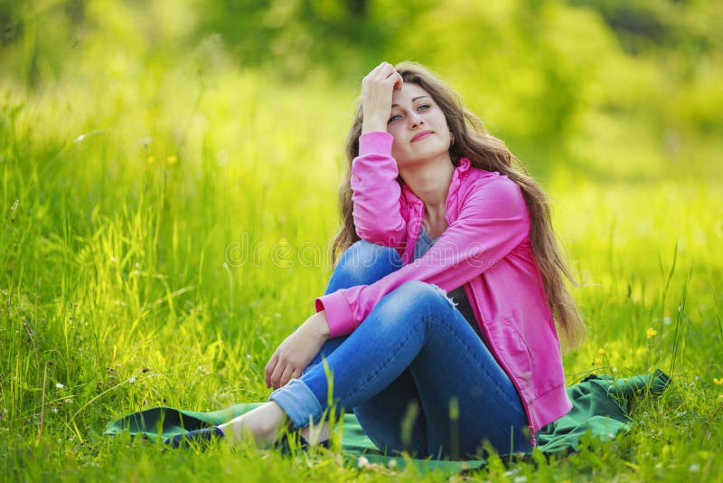 Girl sitting in nature stock image. Image of adult, face - 214087571