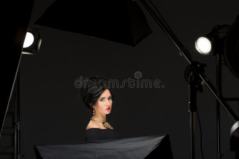 A Beautiful Girl Sitting in the Studio Stock Image - Image of look ...