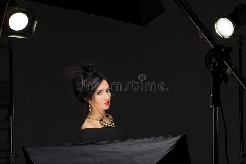 A Beautiful Girl Sitting in the Studio Stock Photo - Image of care ...