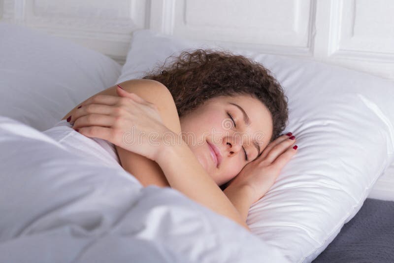 Beautiful Girl Sleeping in Bed Alone. Stock Photo - Image of pillow ...