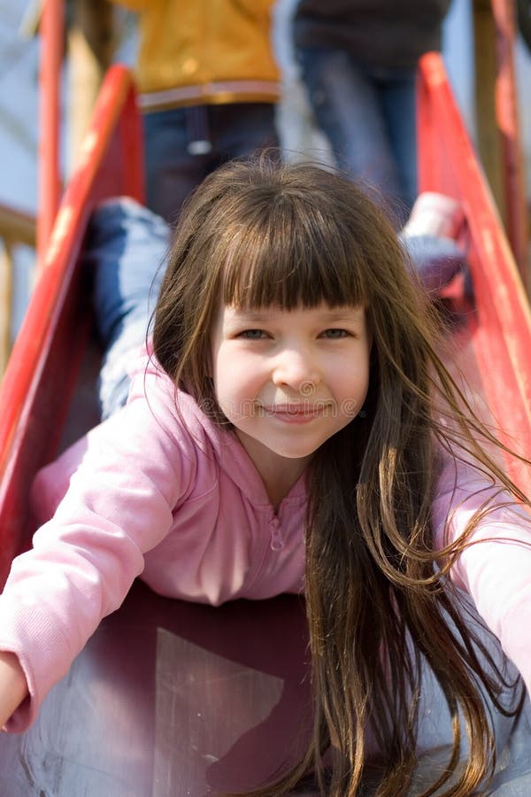 Beautiful Girl on Slide stock image. Image of aged, friend - 2191247