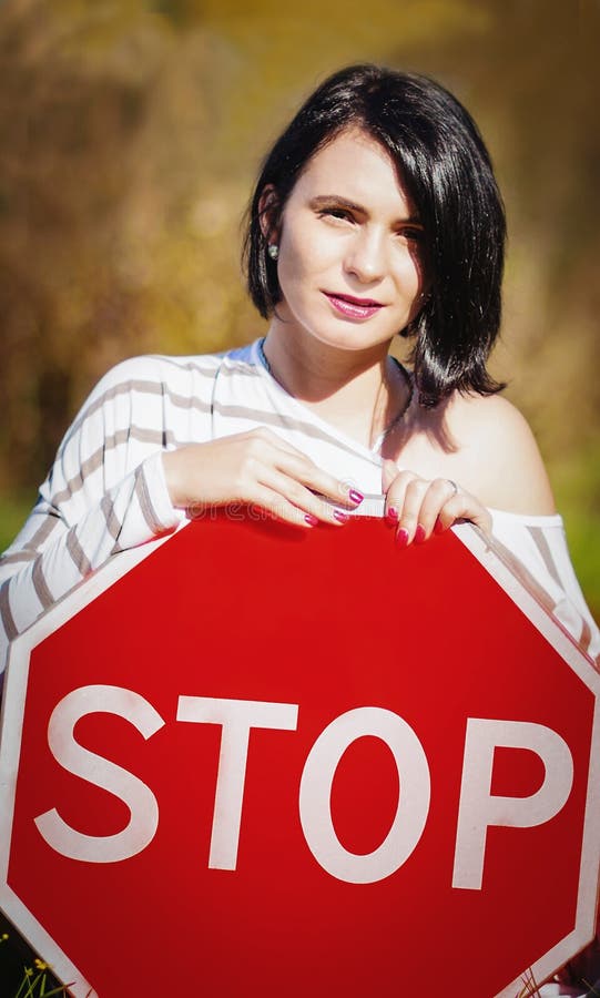 Beautiful Girl with Stop Sign Stock Image - Image of females, stop ...