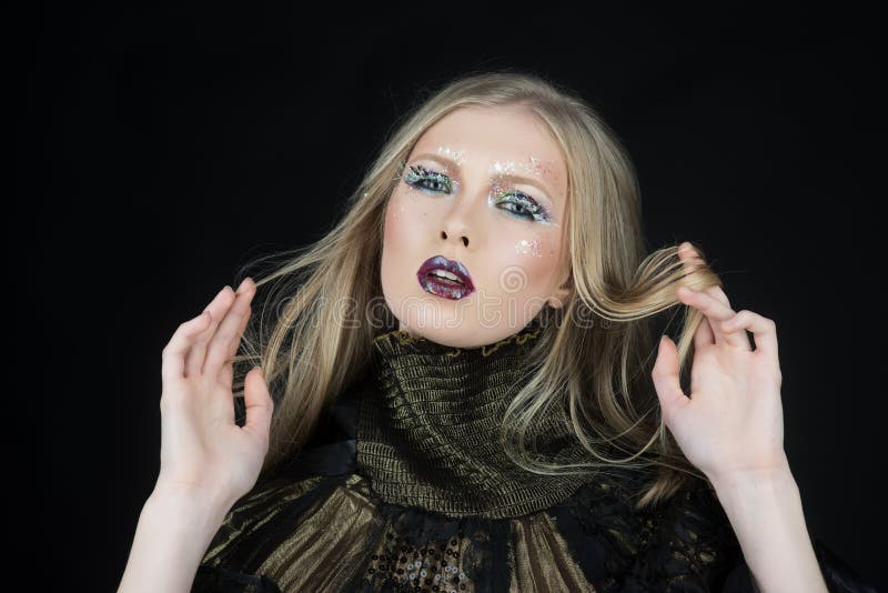 Beautiful Girl in Studio on a Black Background. Cosmetics Stock Photo ...