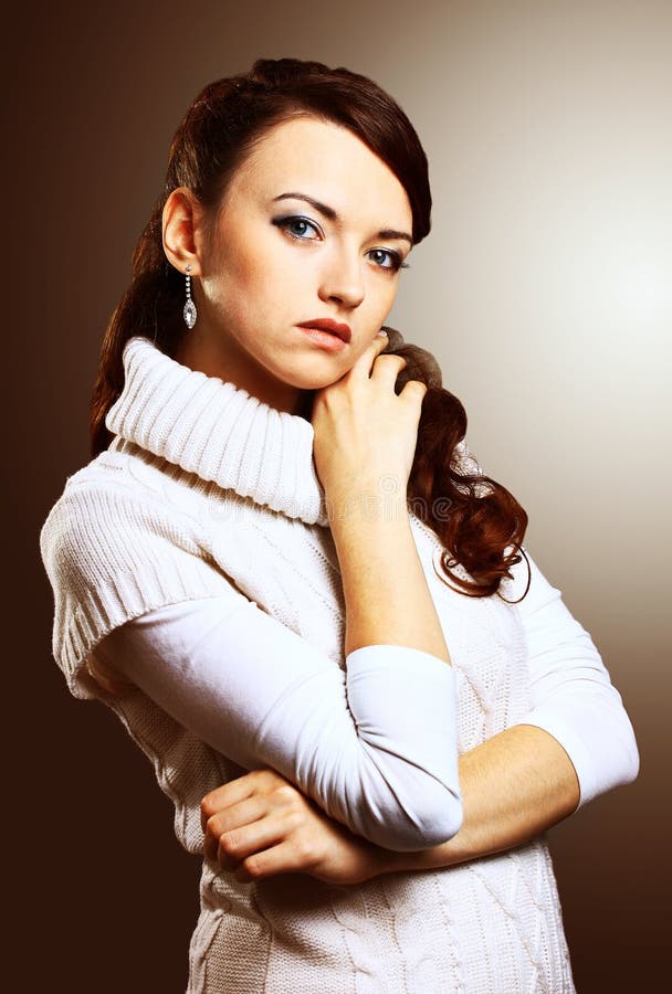 Beautiful girl in sweater stock photo. Image of home - 46624458