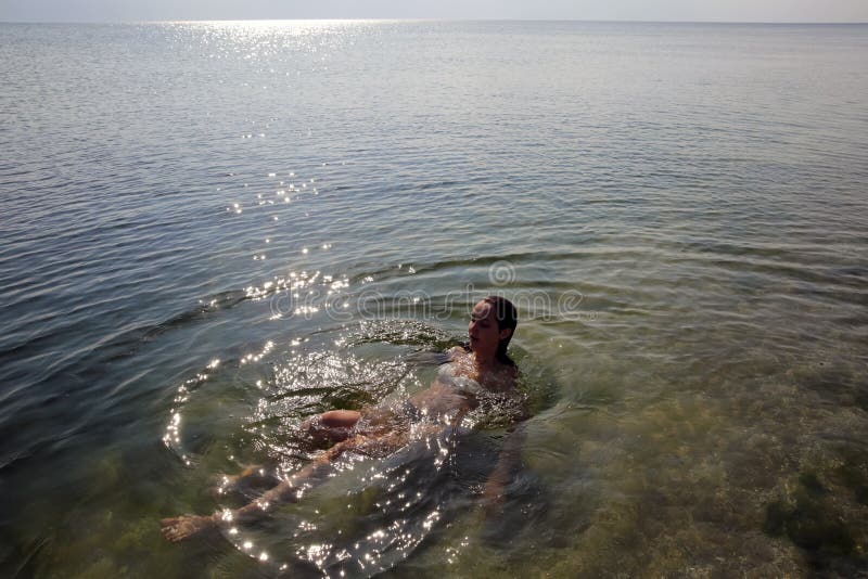 Beautiful Girl Swimming in the Sea Stock Photo - Image of beach ...