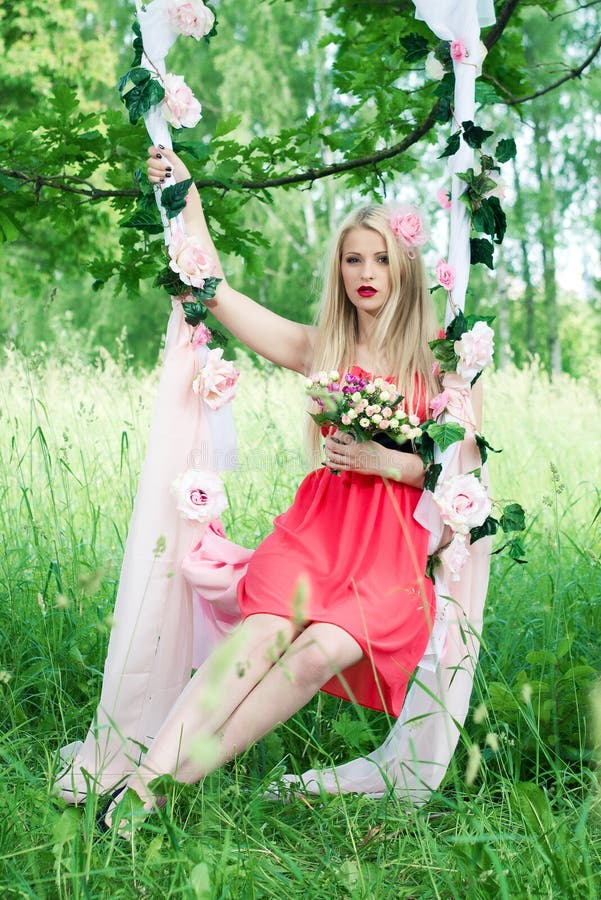 Beautiful girl on a swing stock photo. Image of picnic - 52209932