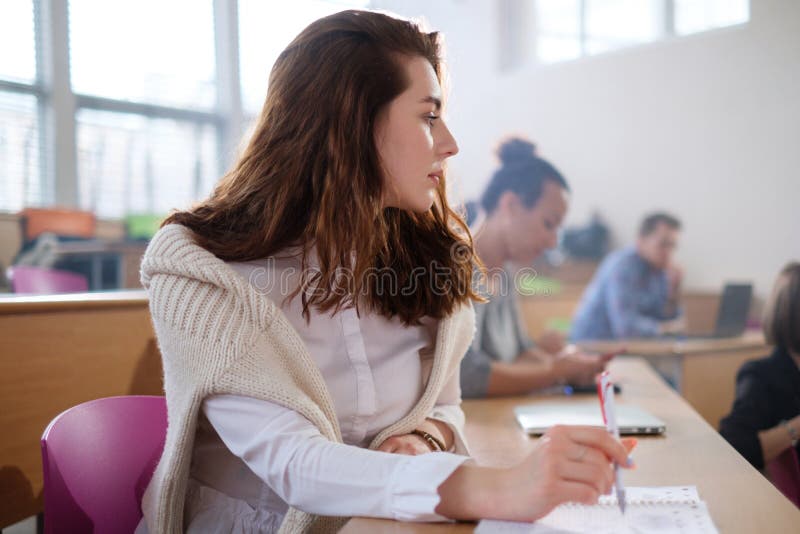 Beautiful Girl Taking Notes in Multinational Group of Students in an ...