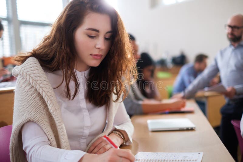 Beautiful Girl Taking Notes in Multinational Group of Students in an ...
