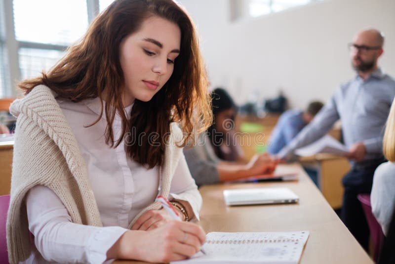 Beautiful Girl Taking Notes in Multinational Group of Students in an ...