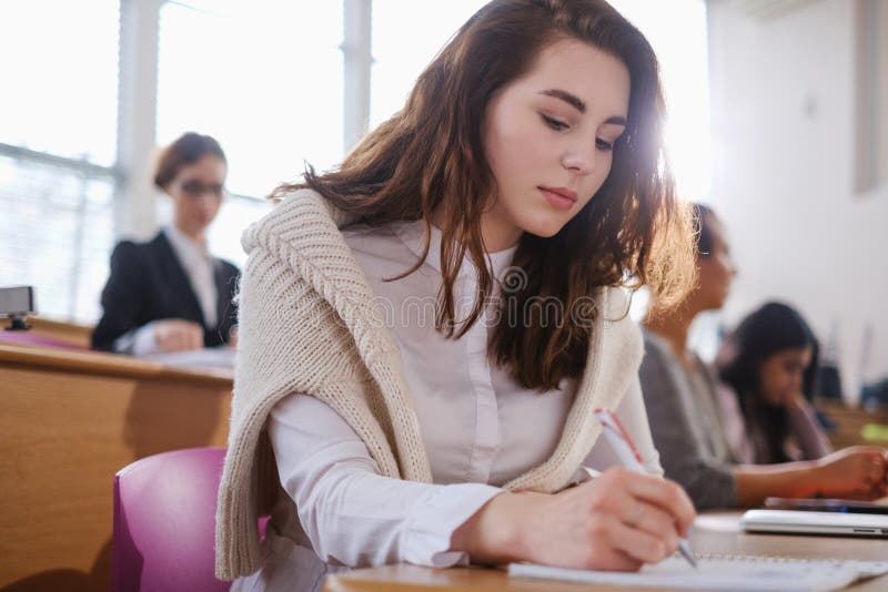 Beautiful Girl Taking Notes in Multinational Group of Students in an ...