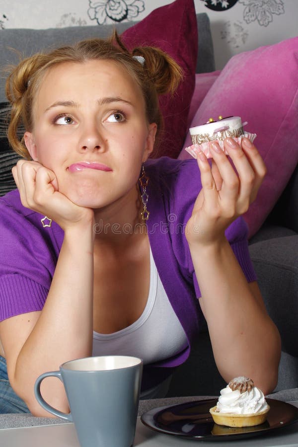 The Beautiful Girl Thinks To Eat a Pie Stock Photo - Image of female ...