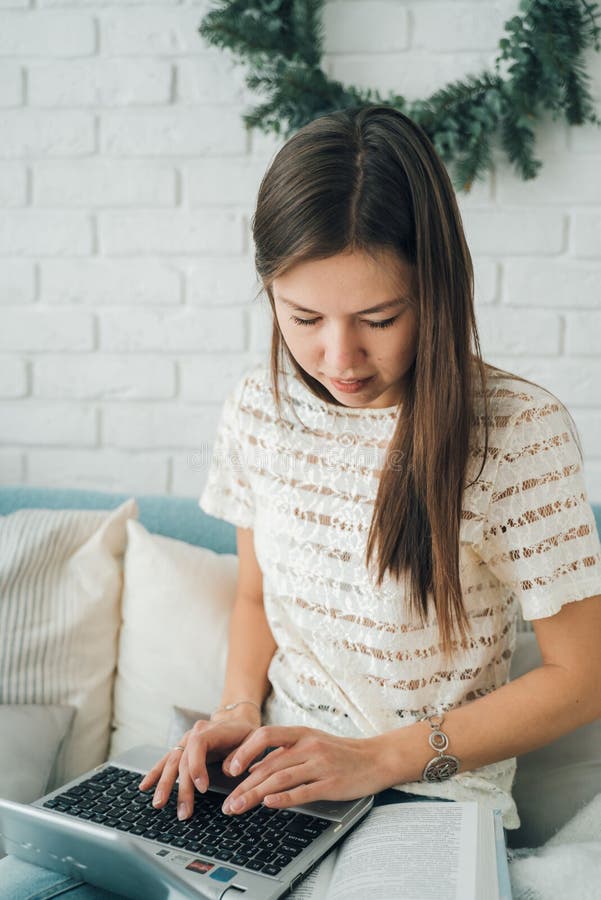 Beautiful Girl is Typing on a Laptop. Stock Image - Image of pallet ...