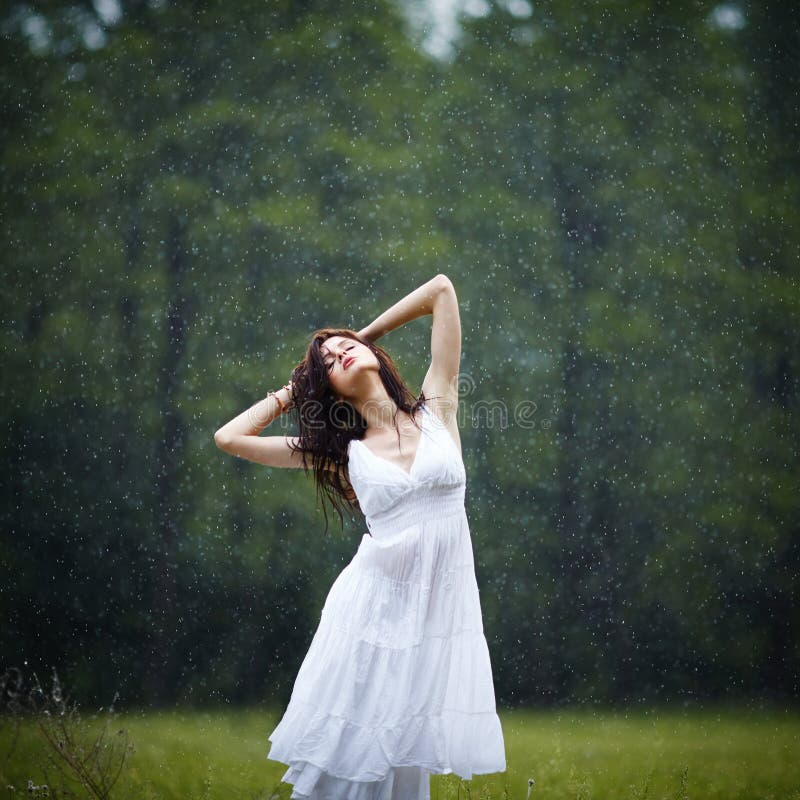 Beautiful girl under rain stock photo. Image of clean - 69033170