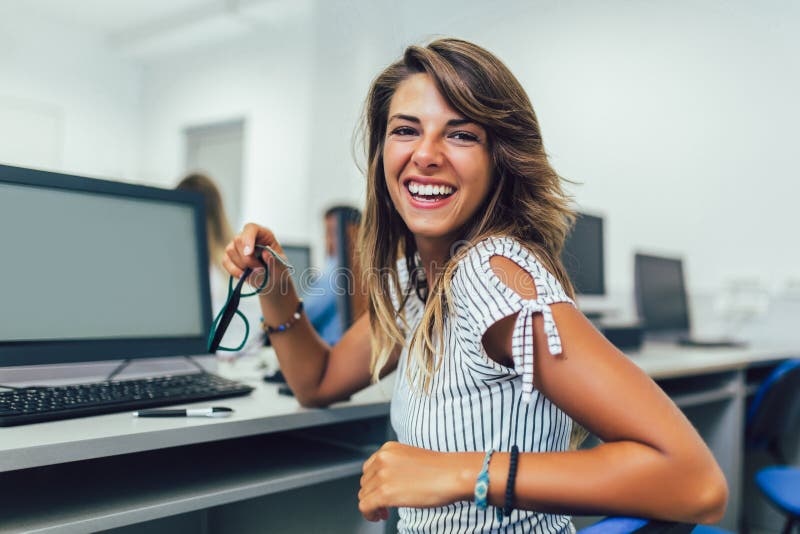 Beautiful Girl Working on a Computer in a Classroom Stock Image - Image ...