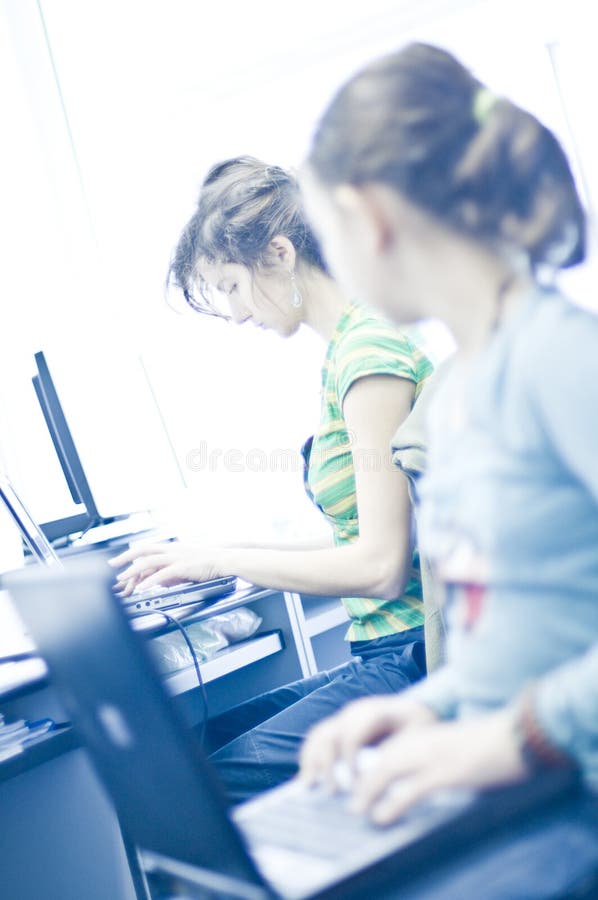Beautiful Girls With Computer Picture. Image: 4902195