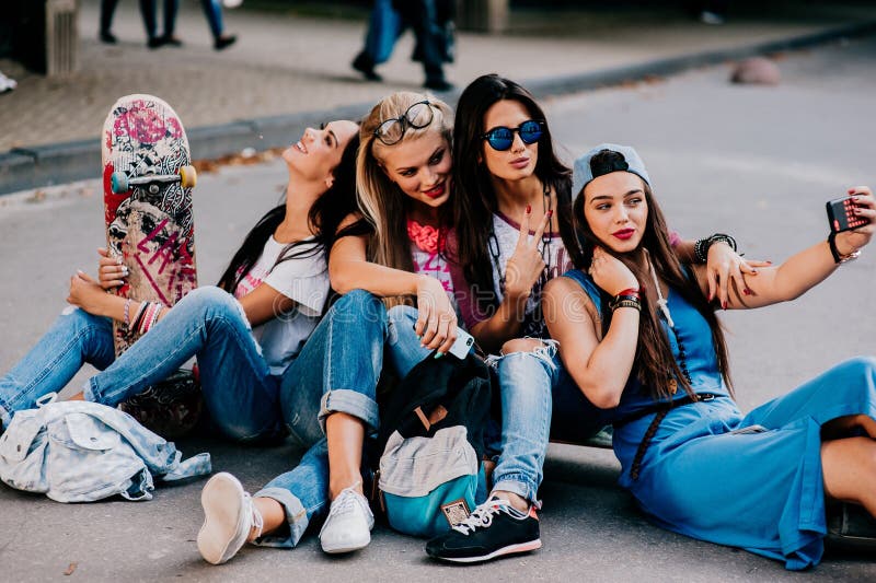 4 Beautiful Girls Sitting Road Stock Photos - Free & Royalty-Free Stock ...