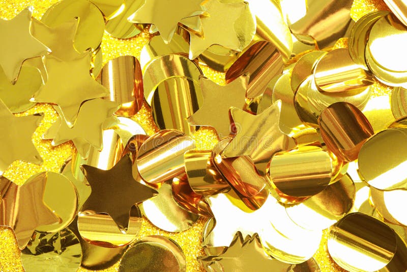 Beautiful Golden Confetti on Shiny Glitter, Top View Stock Photo ...