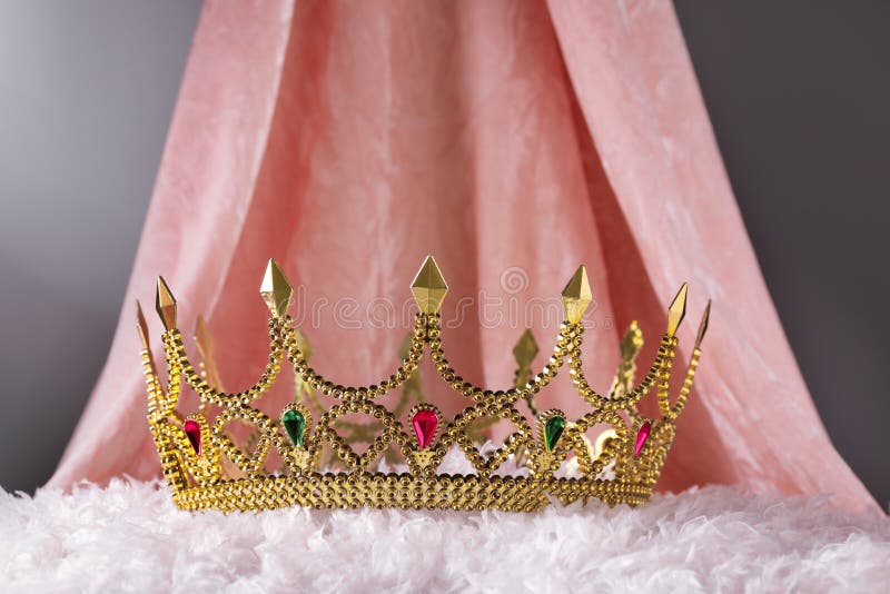 Beautiful Golden Crown with Gems on White Soft Cloth Stock Image ...