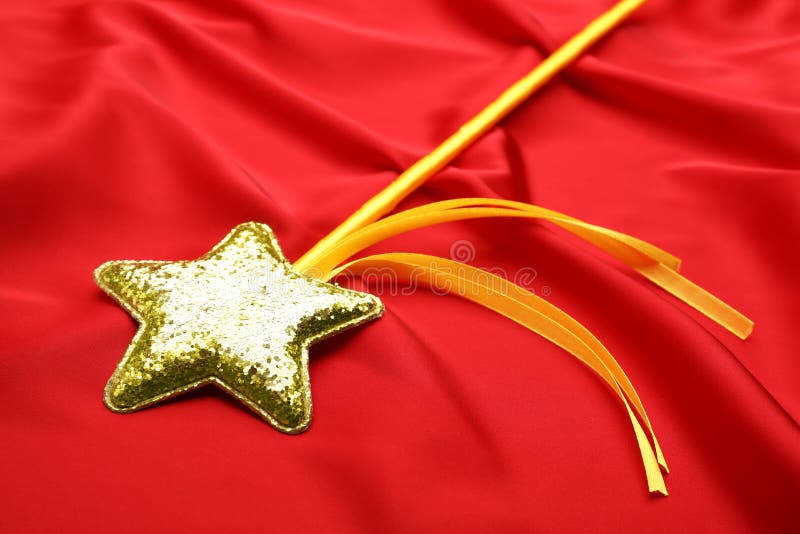 Beautiful Golden Magic Wand on Red Fabric, Closeup Stock Image - Image ...