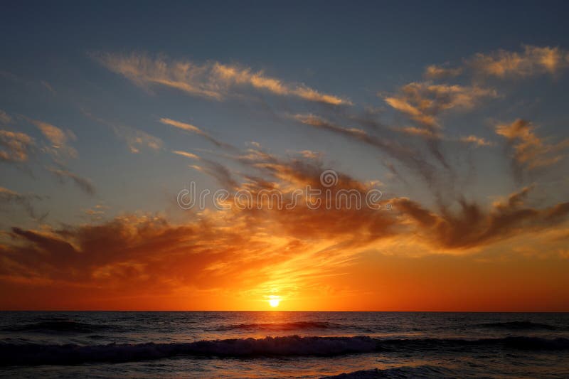 Beautiful Golden Sunset on the Beach Over the Ocean with Feathery ...