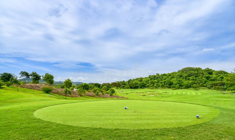 A Beautiful Golf Course , Sand Bunker and Green Grass Stock Photo ...